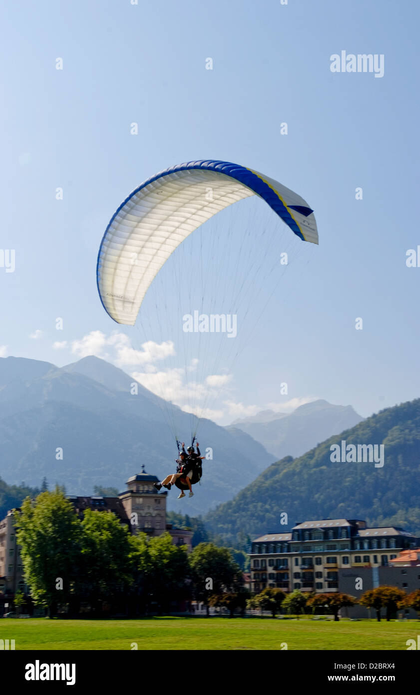 Paragliding From Swiss Alps In Interlaken, Switzerland Stock Photo - Alamy