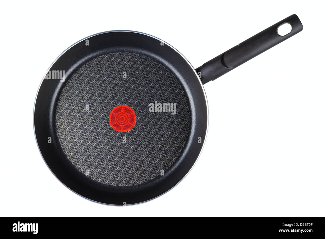 Frying pan with a teflon covering isolated on a white background Stock ...