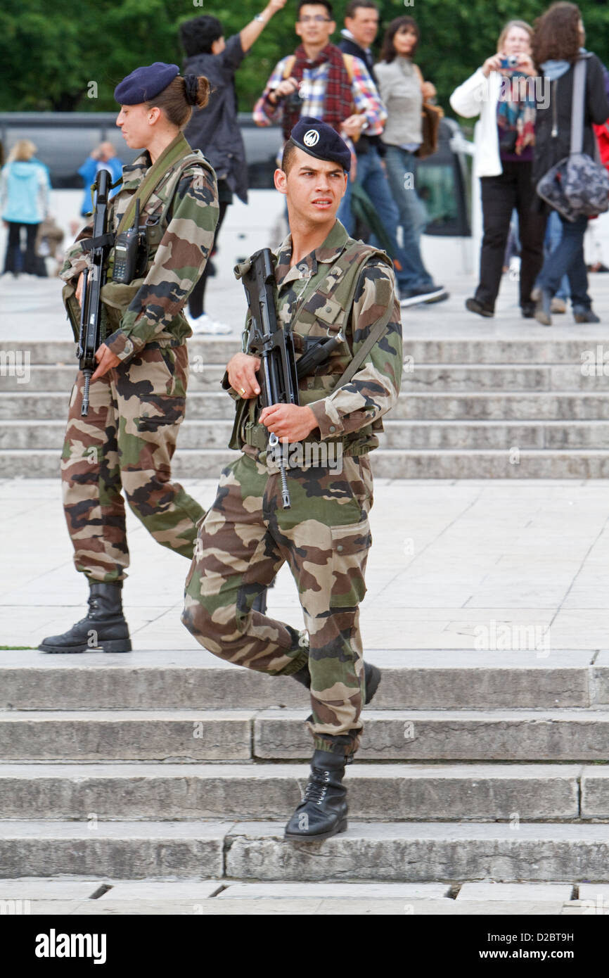 French soldiers on duty near the Eiffel Tower in Paris France Stock ...