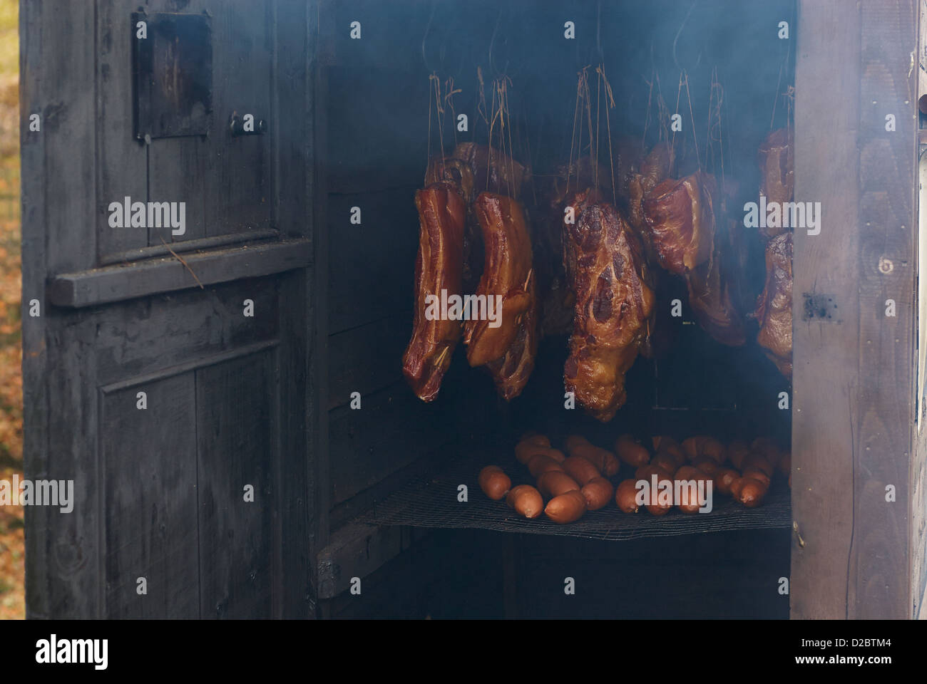 Smoked meat drying in smokehouse, countryside, homemade Stock Photo - Alamy