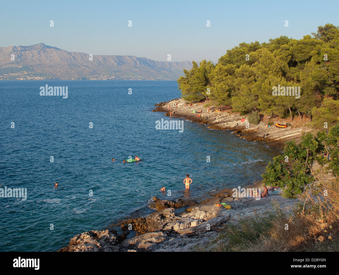 Postira, Croatia, Island of Brac, tourists bathe in a Felsenkueste ...