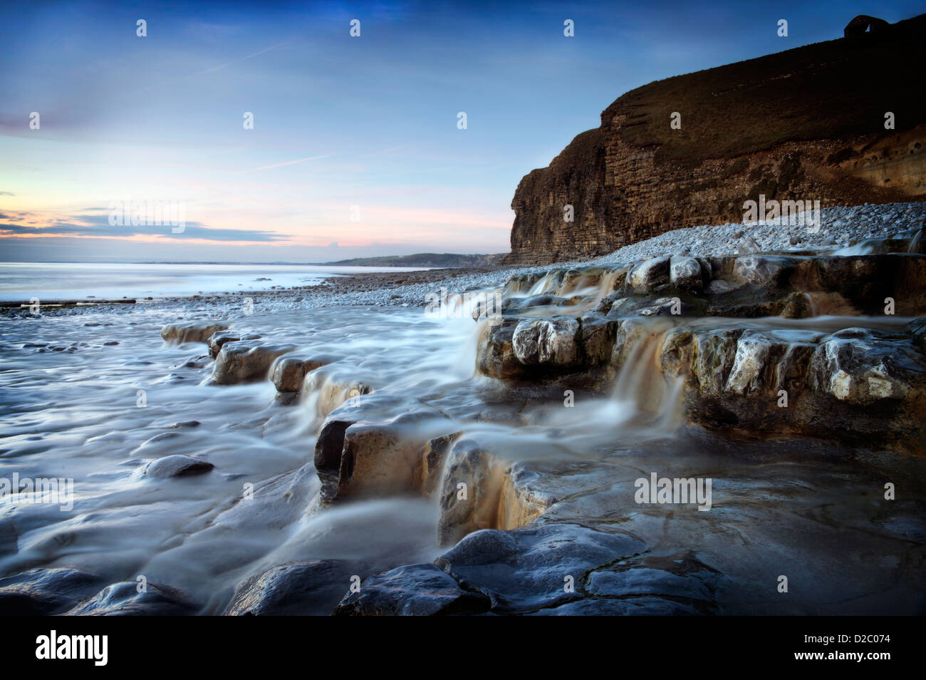Waterfall on Monknash beach Stock Photo - Alamy