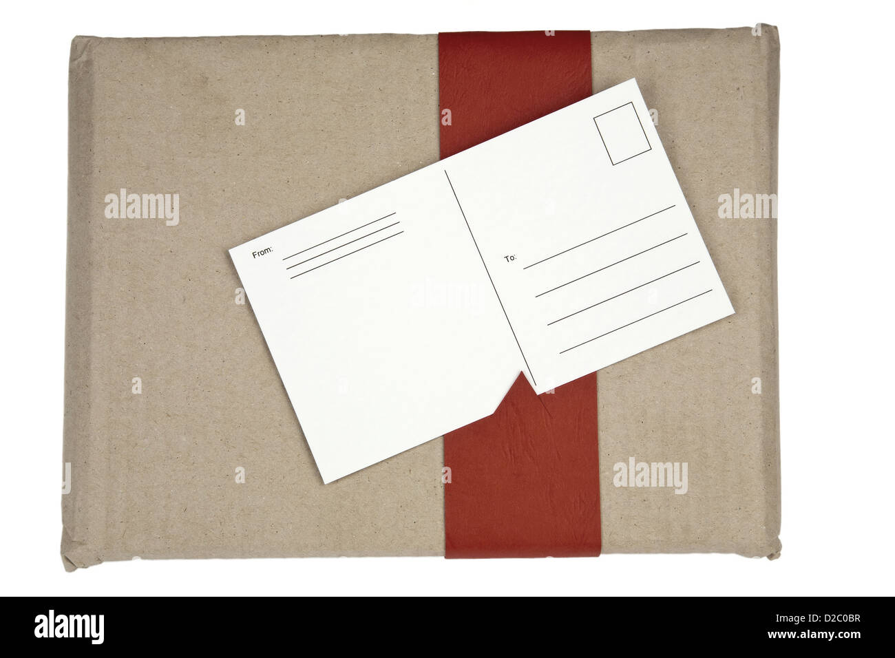 Wrapped box and postcard Stock Photo - Alamy