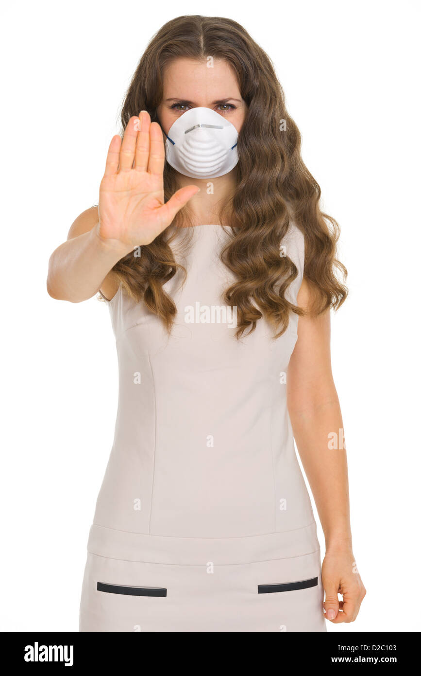 Young woman in cone mask showing stop gesture Stock Photo - Alamy