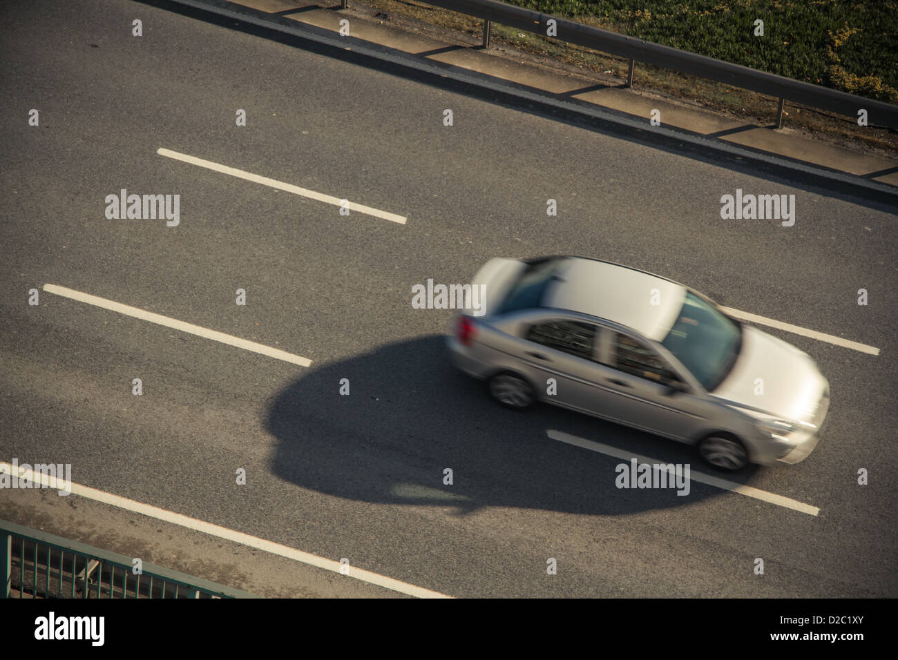 High angle view of a car on an asphalt highway road Stock Photo - Alamy