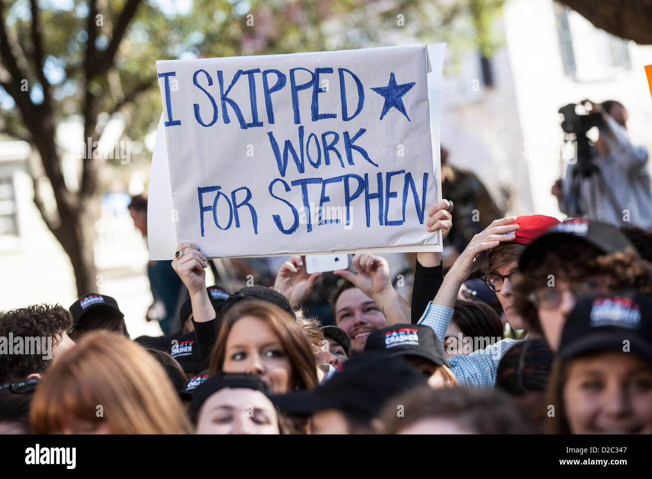 Students hold signs supporting Comedian Stephen Colbert during a rally ...