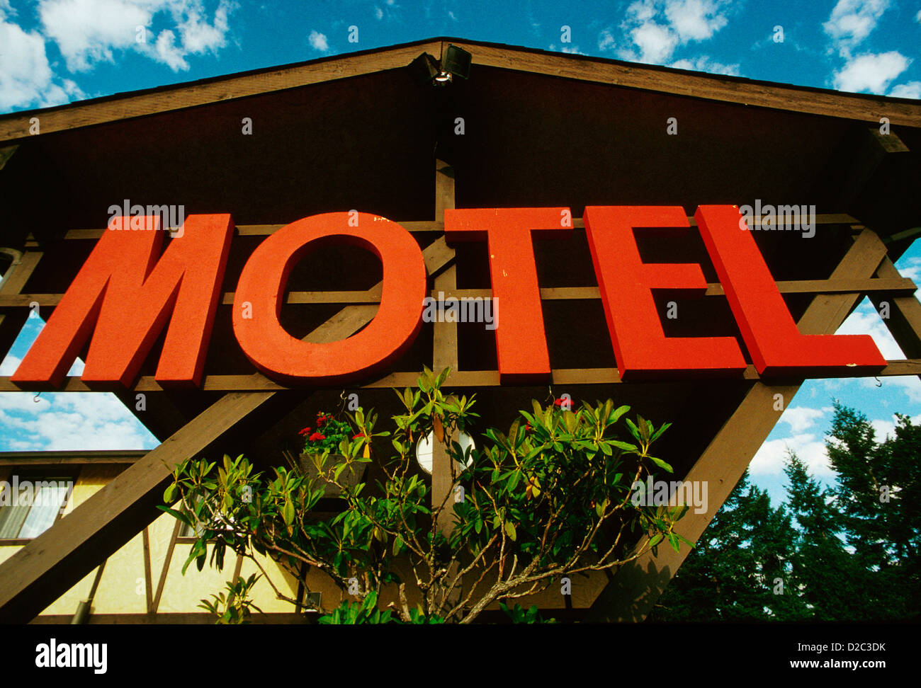 Motel With Large Red Sign In Front Stock Photo - Alamy