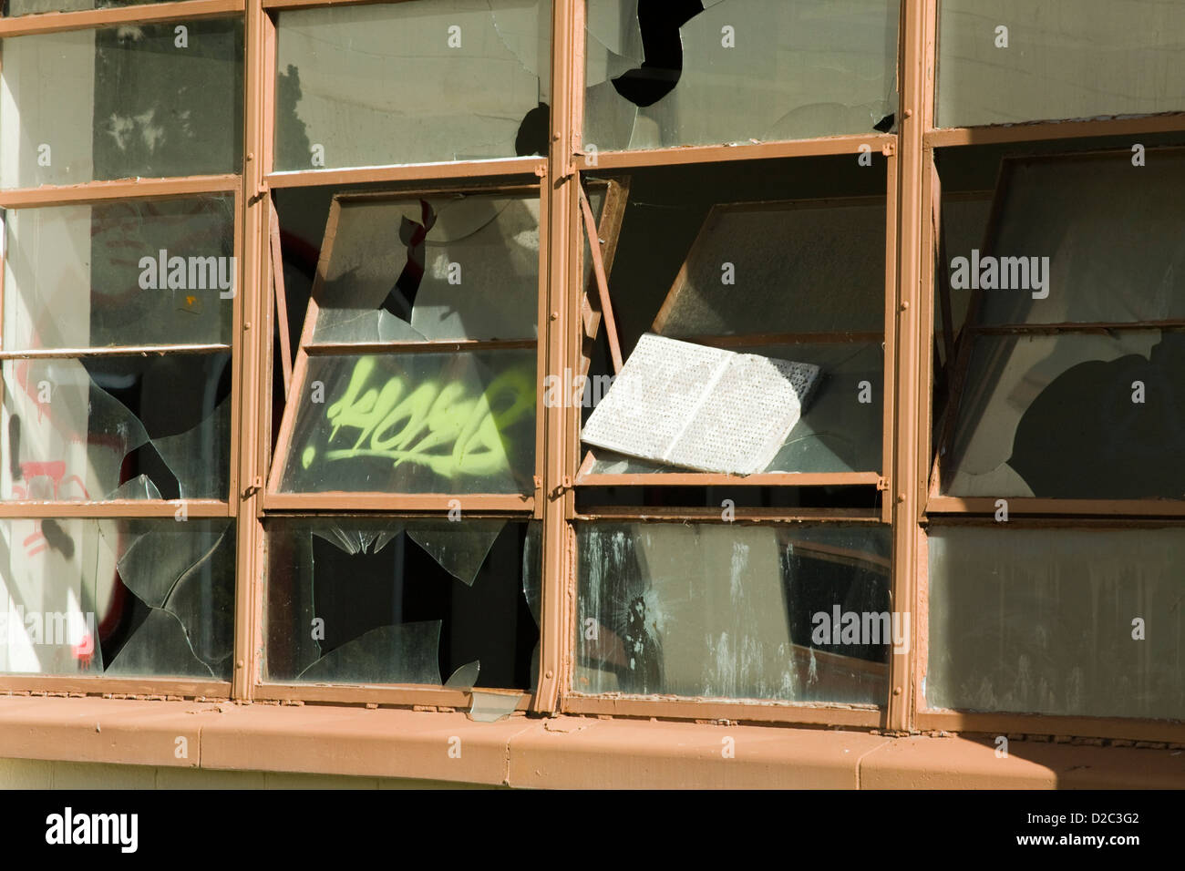 A broken window in an abandoned building on the old military base of ...