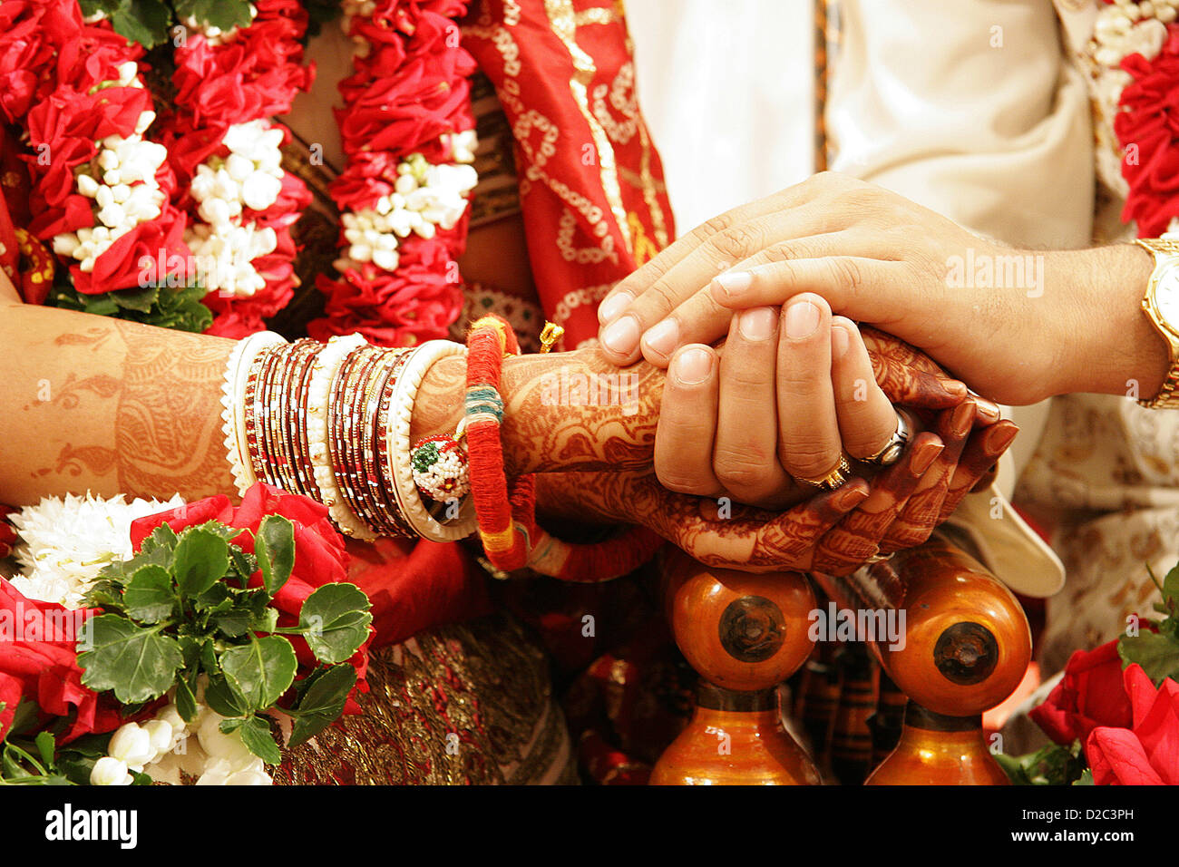 The Hands Of Indian Bride And The Bridegroom Locked As The Ritual Of ...