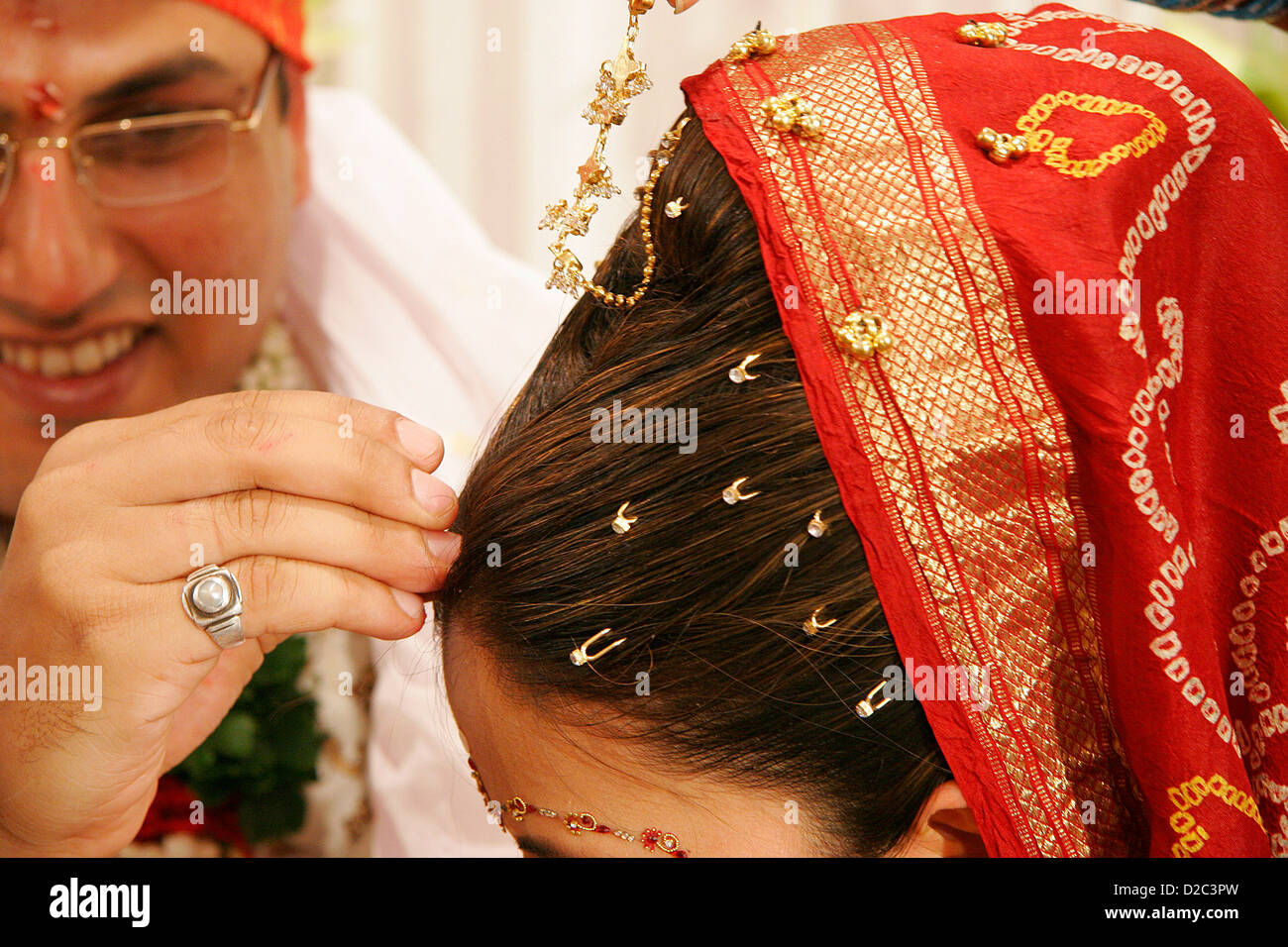 Indian Gujarati Bridegroom Putting Red Powder Called 'Sindoor' On Bride ...
