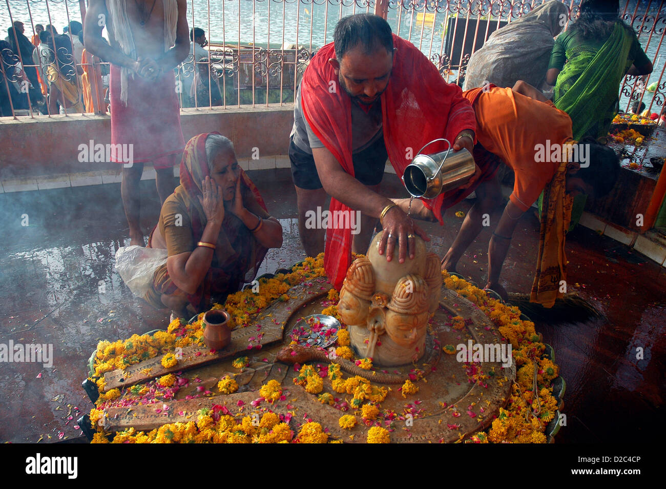 Indian pilgrims praying offering water lord shiva hi-res stock ...