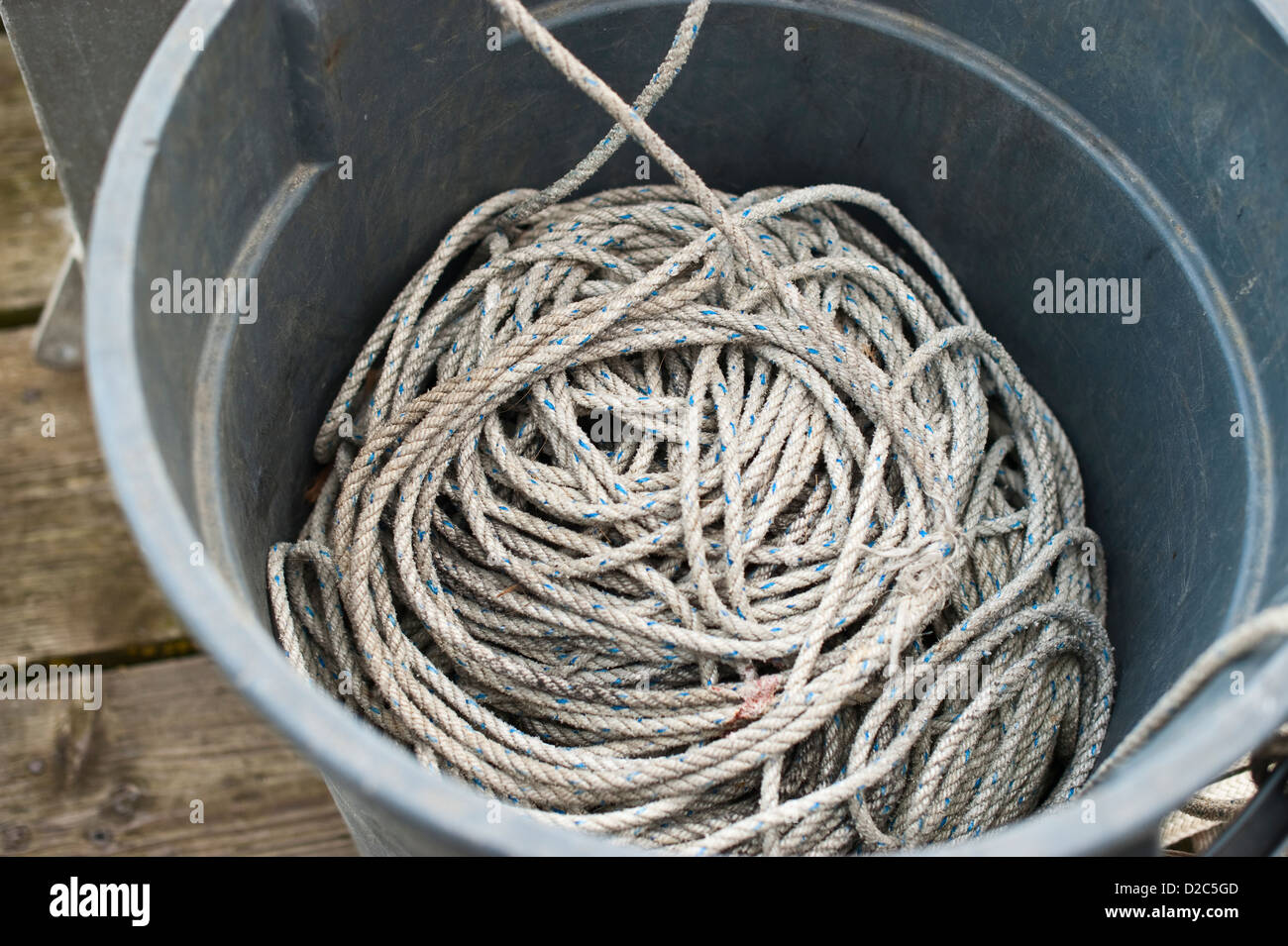 Plastic garbage can filled with rope in Sitka, Alaska, USA Stock Photo ...