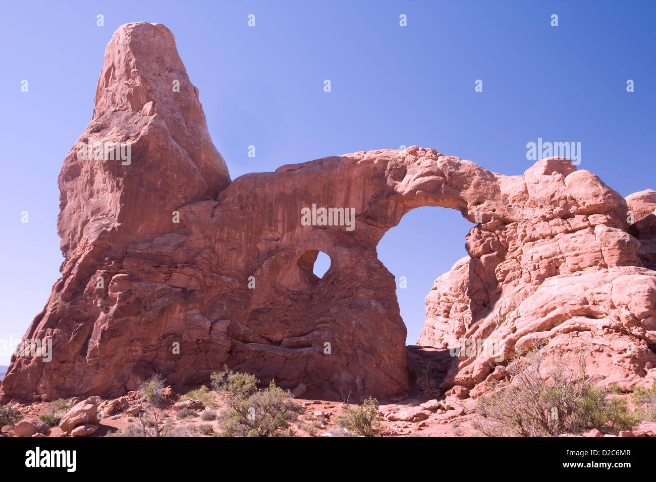 A large beautiful pink arch against a blue sky Stock Photo - Alamy