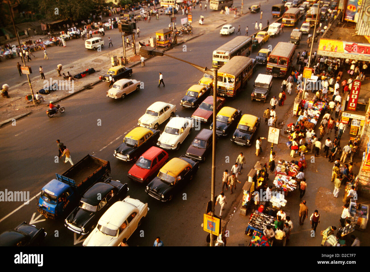 India, Calcutta. Street Scene Showing Traffic And Crowds Stock Photo ...