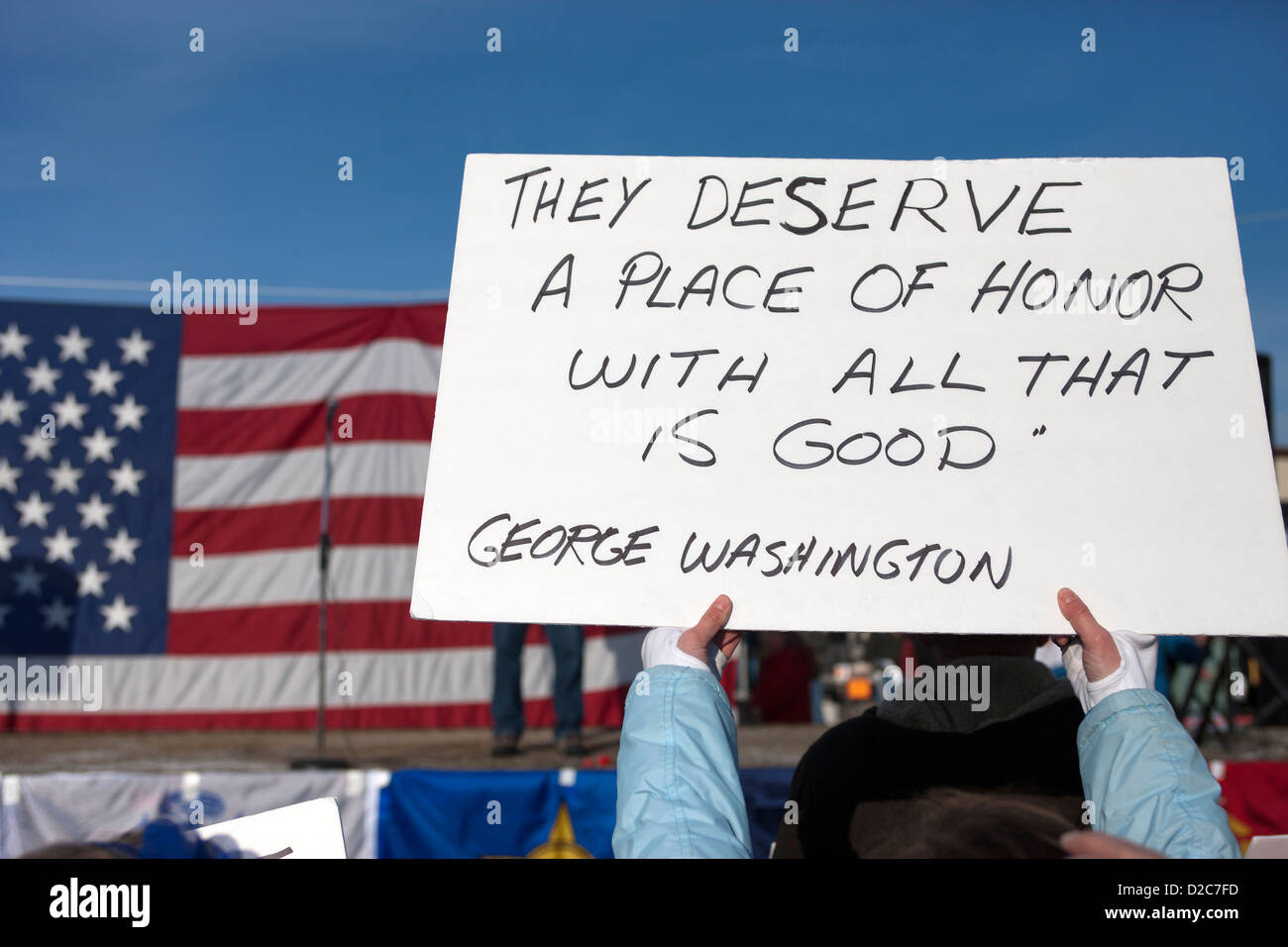 A sign is held up at a pro 2nd amendment rally in Coeur d'Alene, Idaho ...
