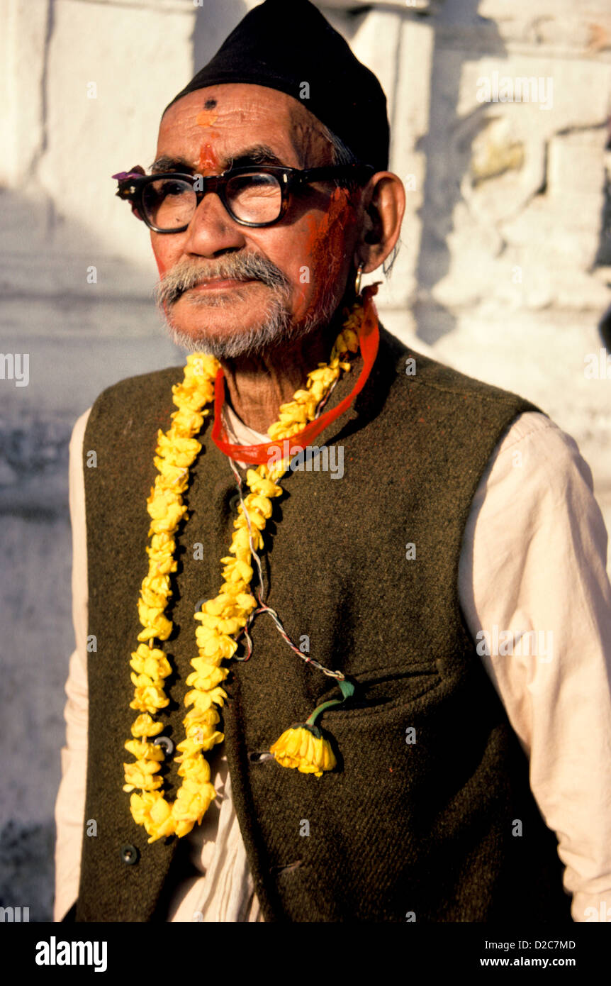 Nepal kathmandu portrait man wearing flowers hi-res stock photography ...