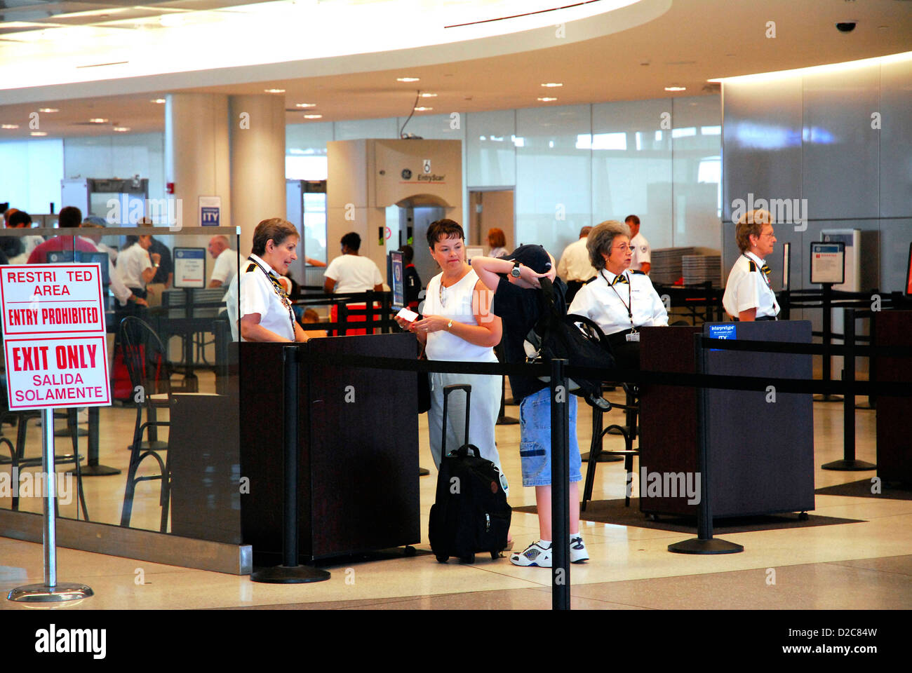 Airport screener hi-res stock photography and images - Alamy