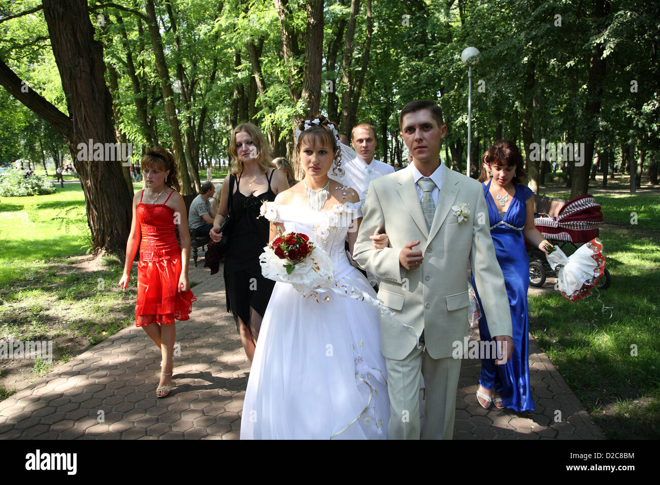 Gomel, Belarus, wedding couple with wedding party on a walk Stock Photo ...