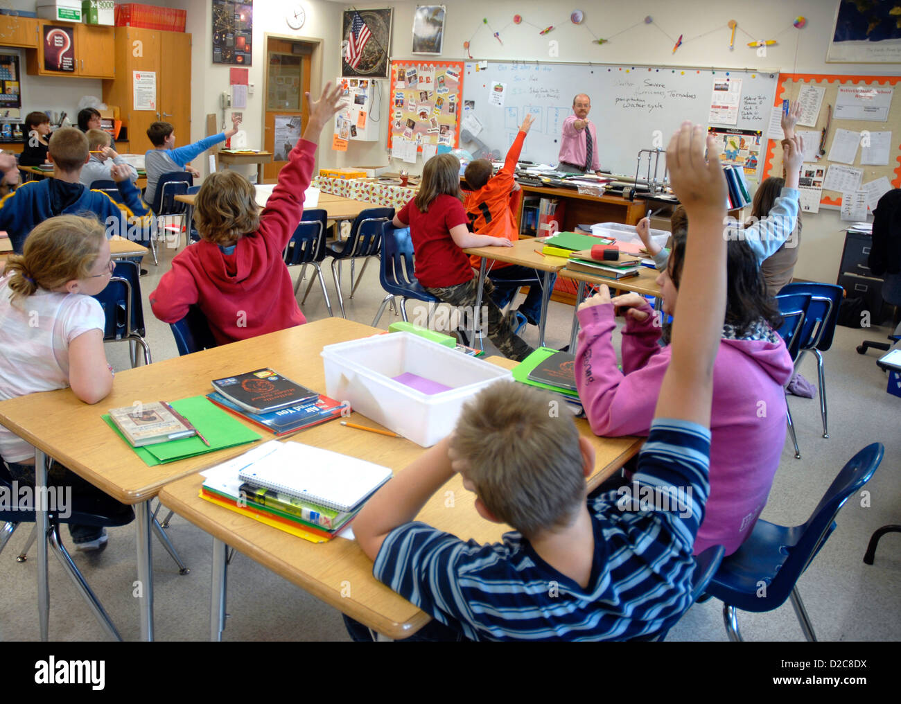 School boy boys girl girls hi-res stock photography and images - Alamy