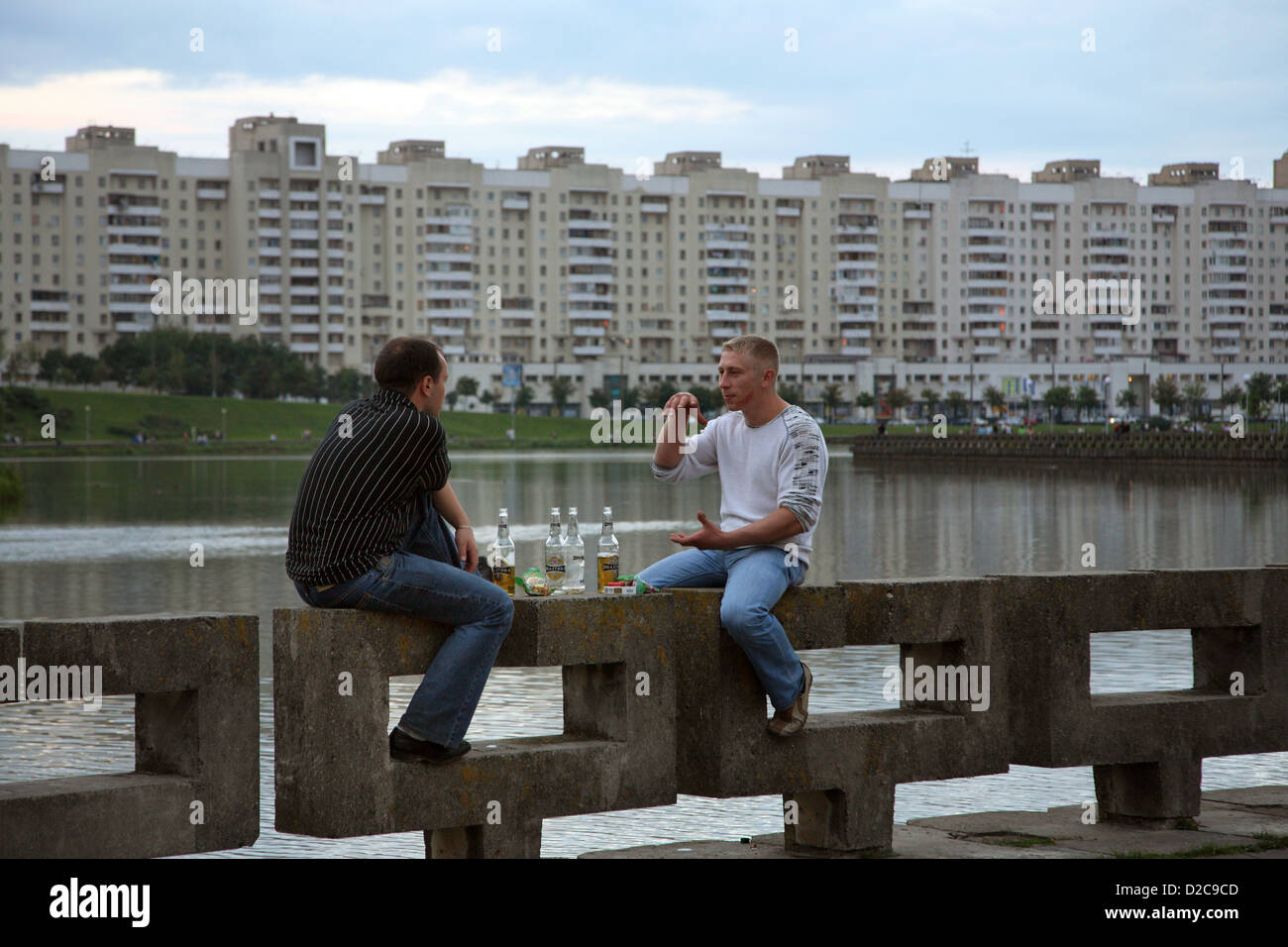 Minsk, Belarus, young men talk on Komsomolskoje Lake Stock Photo - Alamy