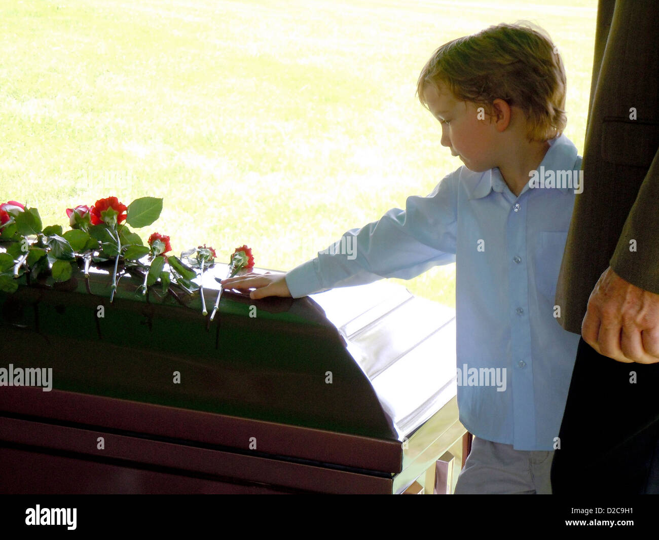 6 year old boy at funeral hi-res stock photography and images - Alamy