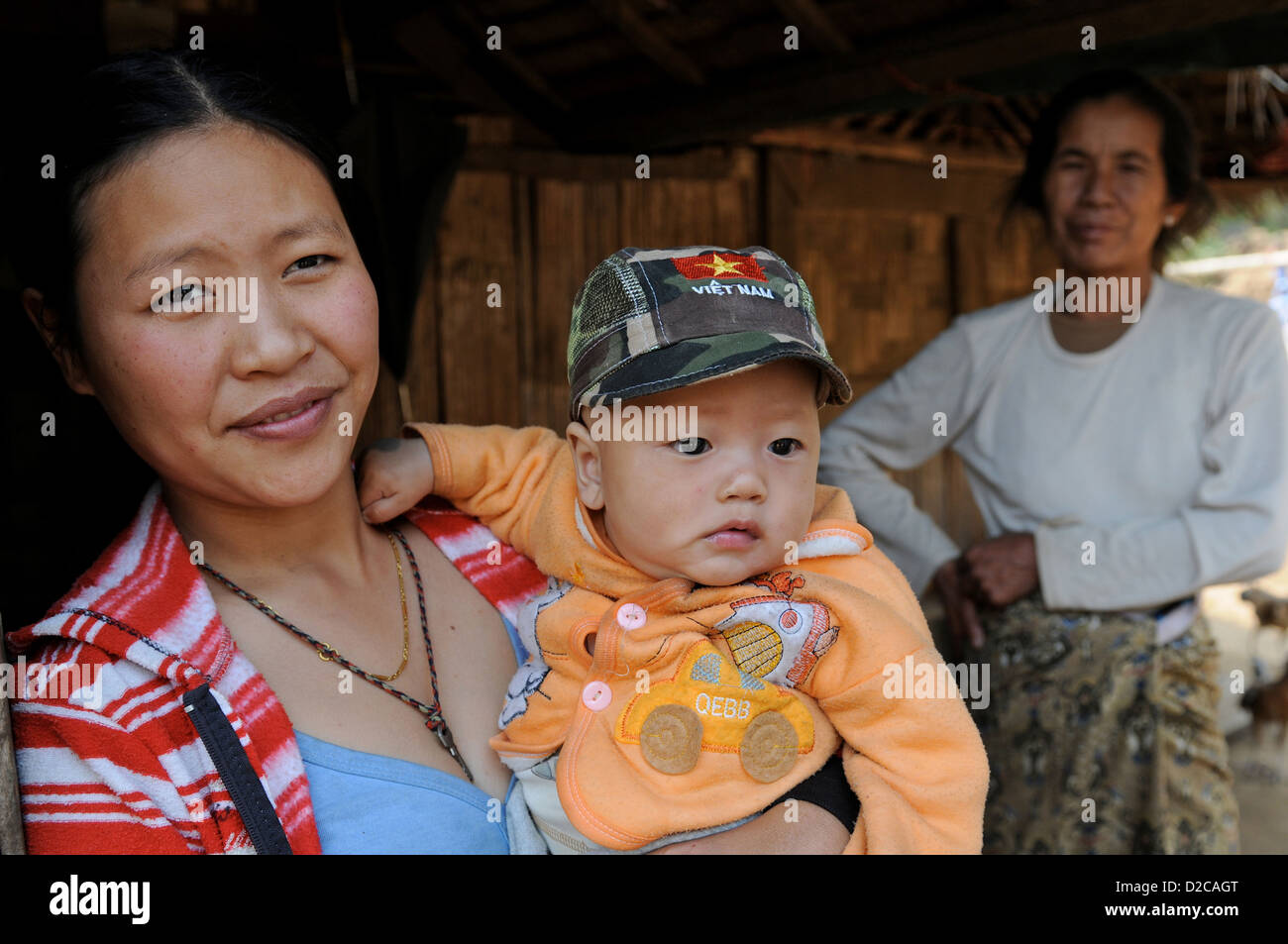 Taunggyi, Myanmar, portrait of a young woman with her child and her ...