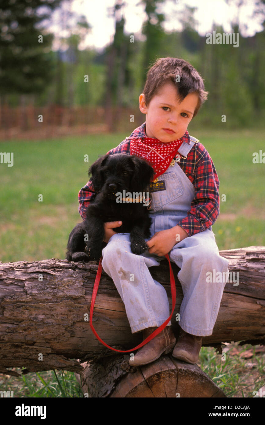 Children and puppy hi-res stock photography and images - Alamy