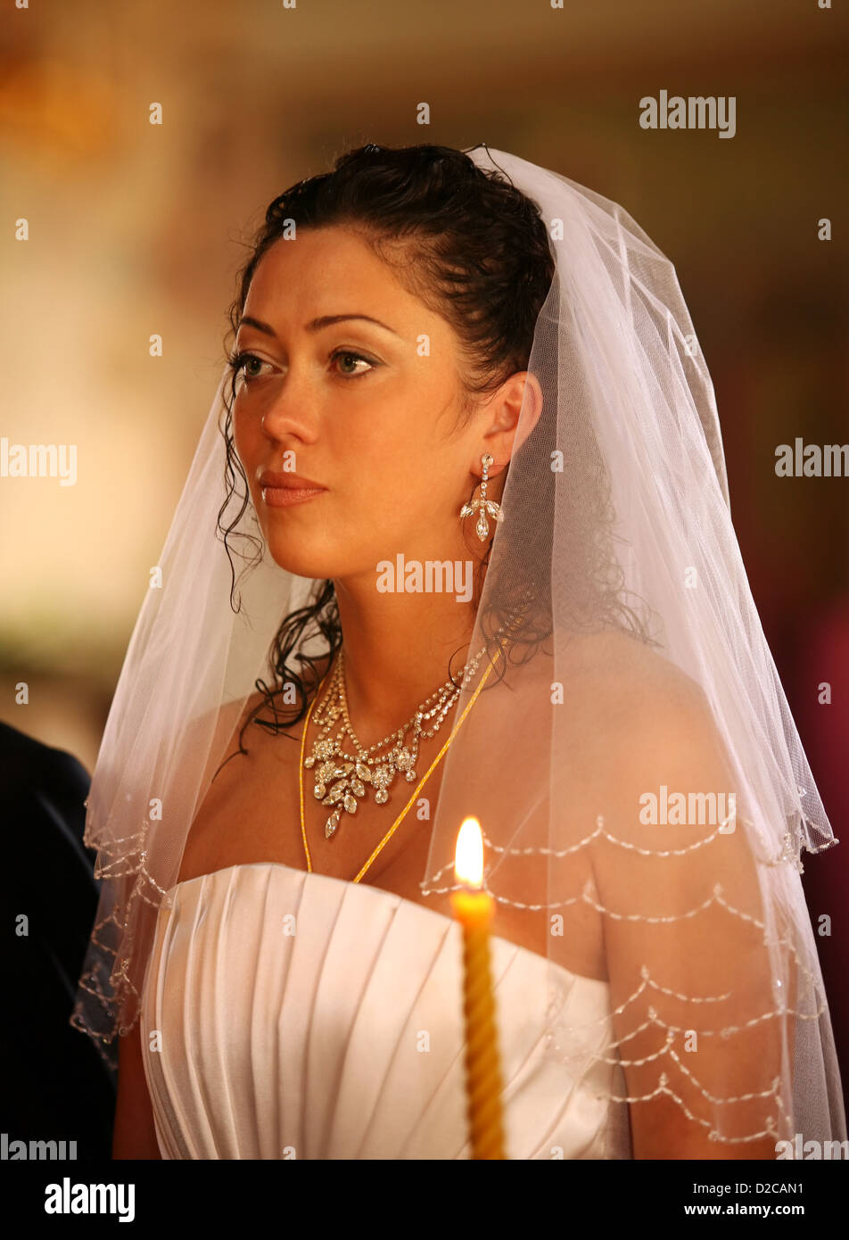 The bride on ceremony of wedding - internal church Stock Photo - Alamy