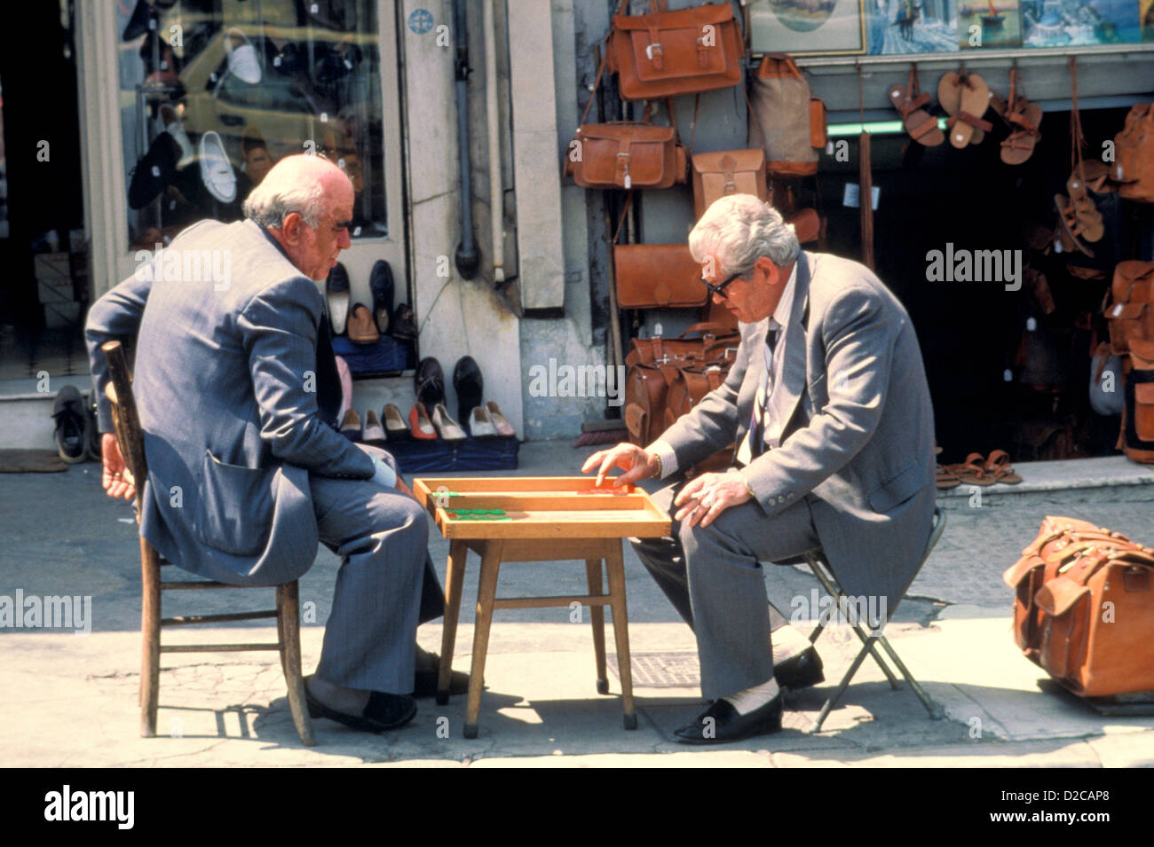 Greece. Local Men Playing Backgammon Stock Photo - Alamy