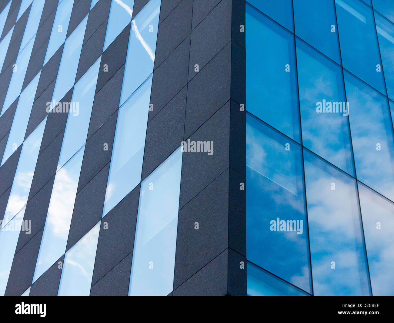 Architectural abstract. Windows with sky reflected Stock Photo - Alamy