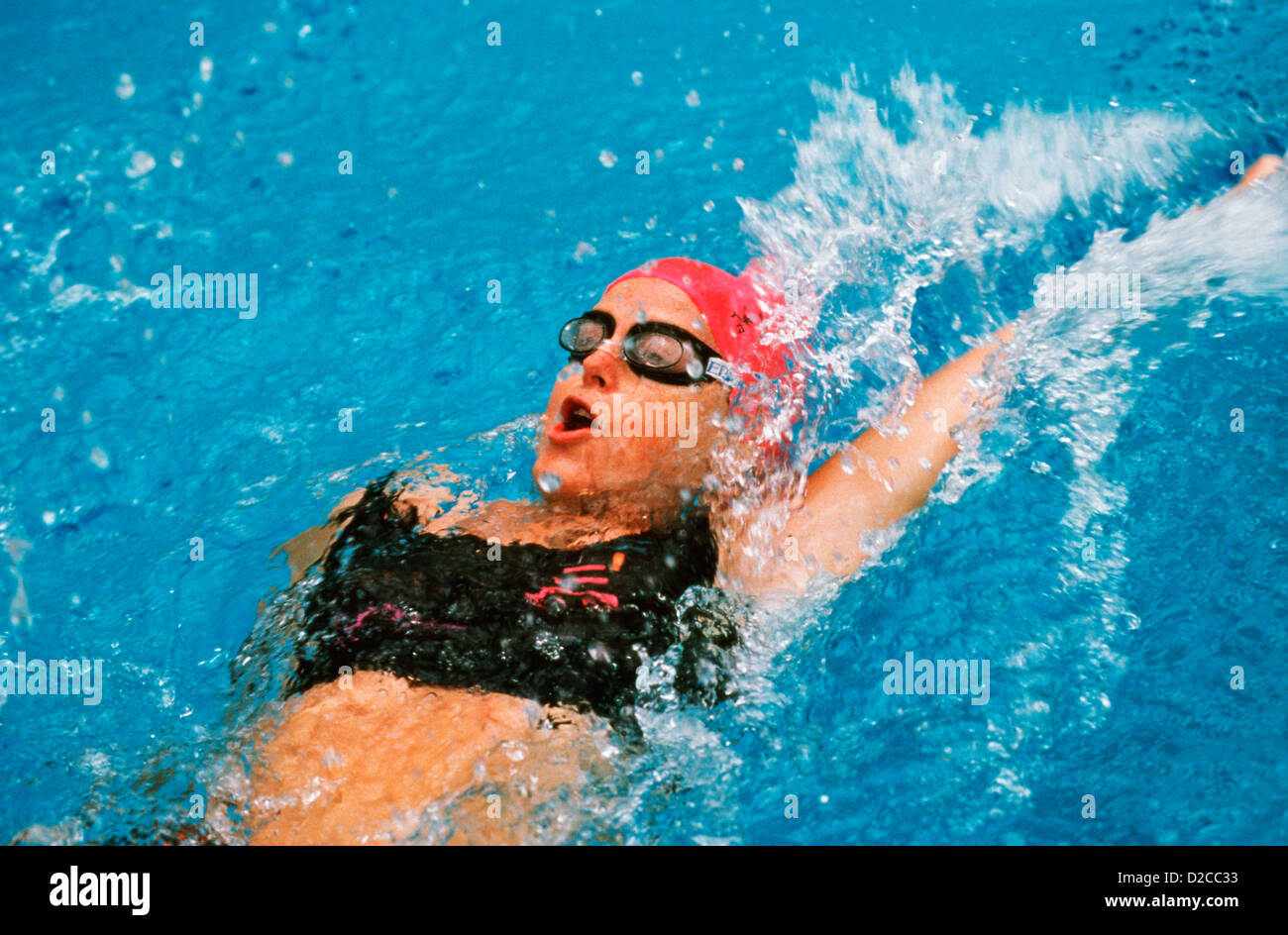 Girls Swimming Backstroke
