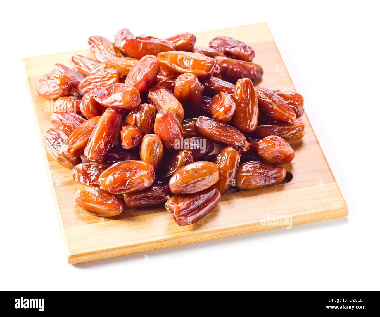 Dried dates isolated on a white background Stock Photo - Alamy