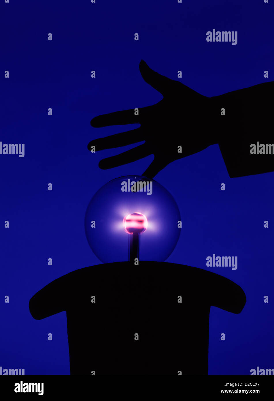 Silhouette Of Magician’S Hand And Crystal Ball Stock Photo - Alamy