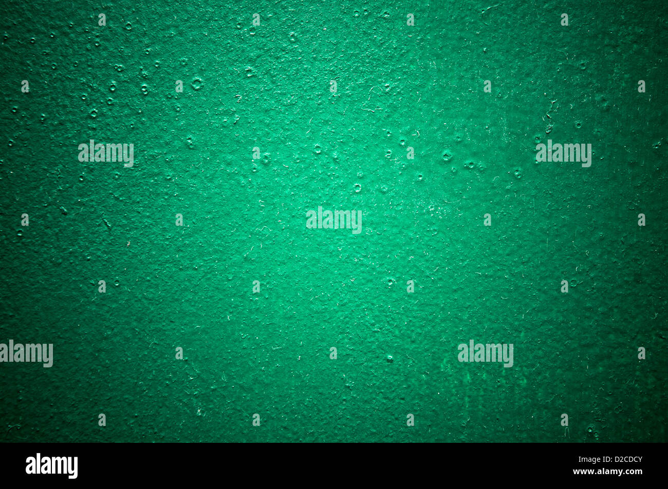 green structural painted wallpaper on the wall Stock Photo - Alamy