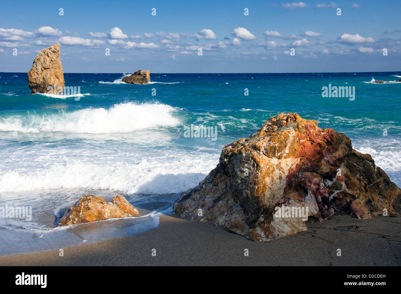 Waves breaking on rocky beach Stock Photo - Alamy