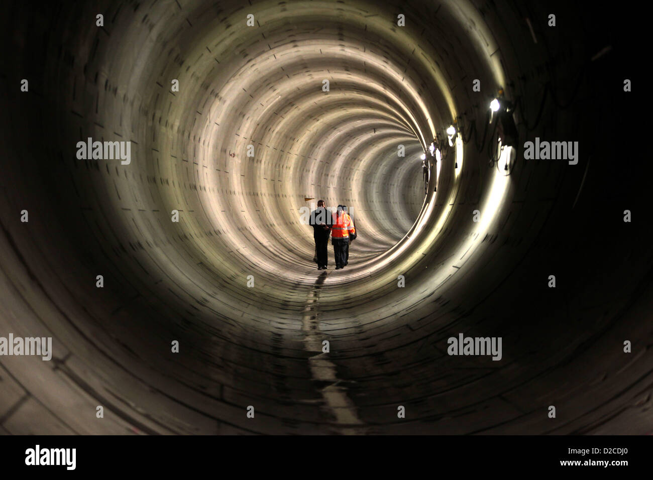 People walking through underground tunnels hi-res stock photography and ...