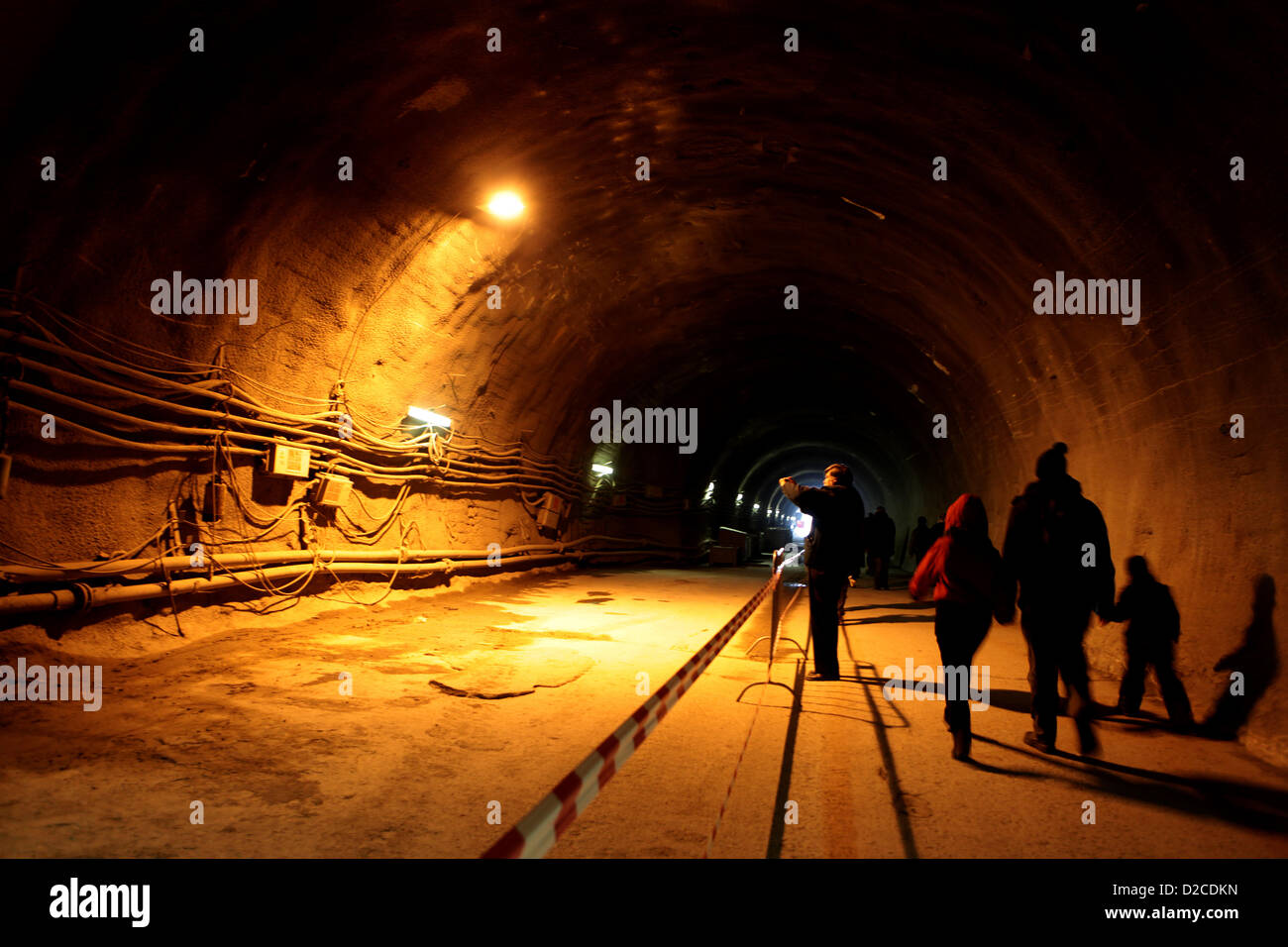 People go through the subway tunnel under construction Stock Photo - Alamy