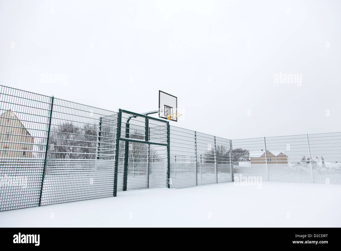 Basketball court covered in snow Stock Photo - Alamy