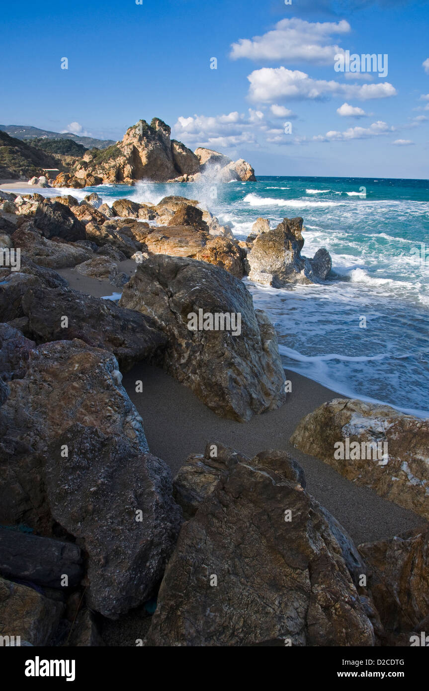 Waves breaking on rocky beach Stock Photo - Alamy
