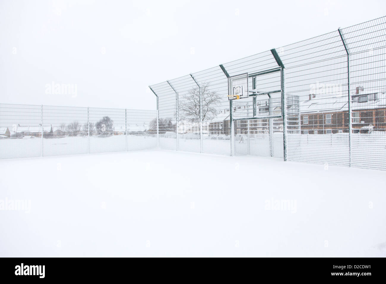 Basketball court covered in snow Stock Photo - Alamy
