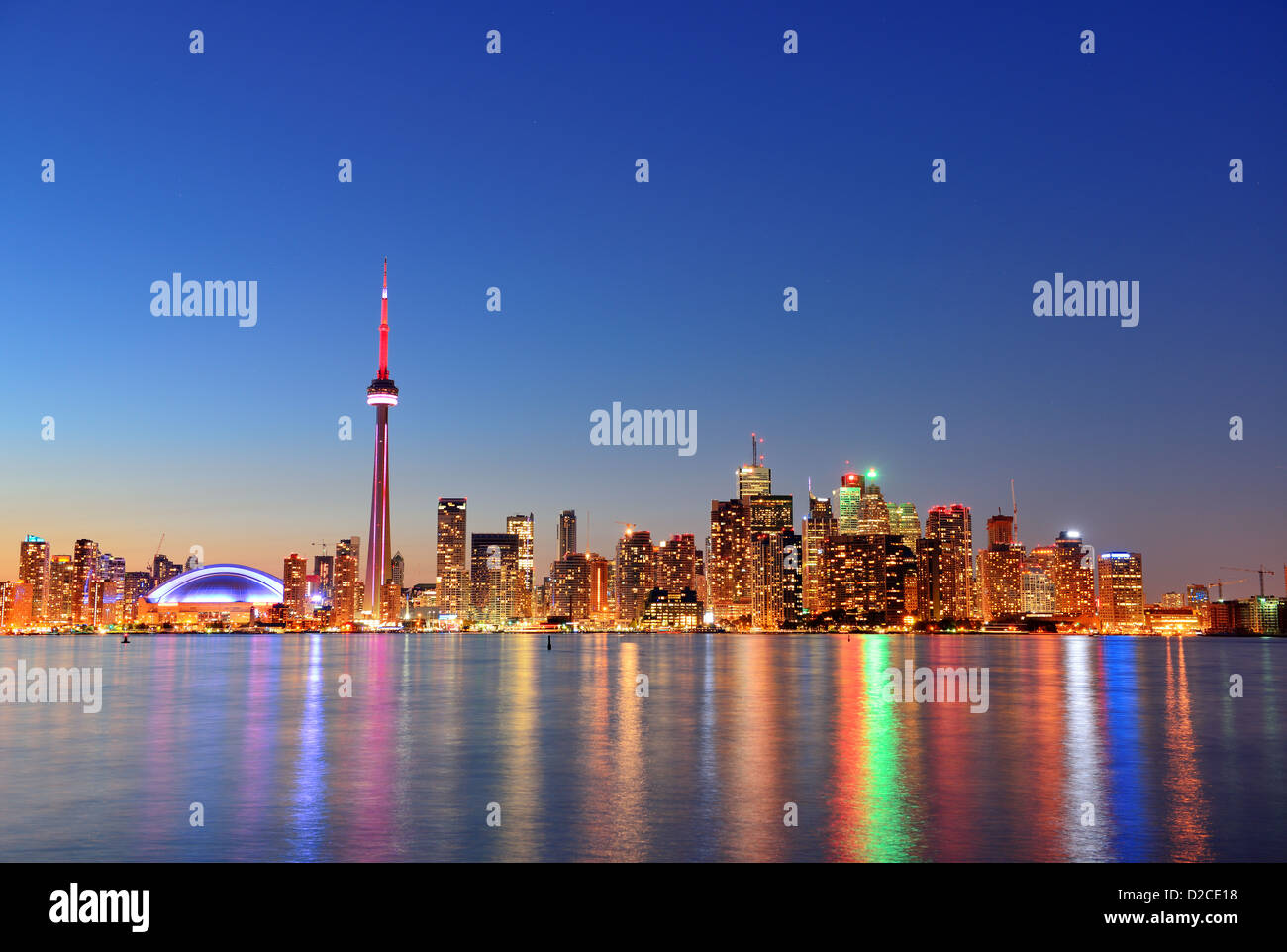 Toronto sunset over lake panorama with urban skyline Stock Photo - Alamy