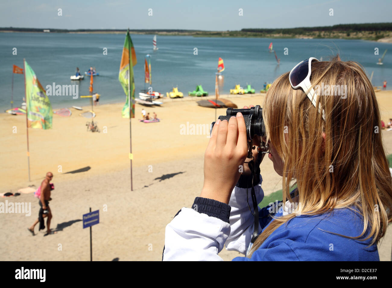 Geierswalde, Germany, the woman watched as lifeguard beach Stock Photo ...