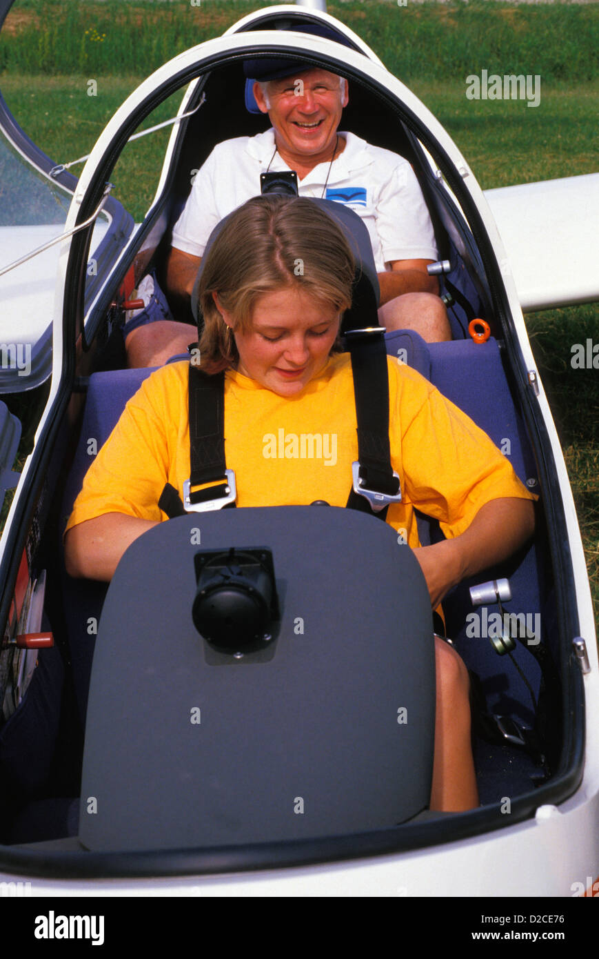 Close-Up Of Two People In Glider Stock Photo - Alamy