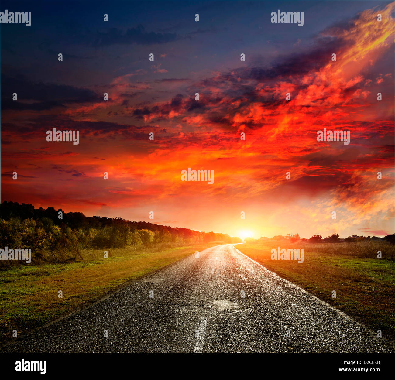 paved country road with surprisingly beautiful sky Stock Photo - Alamy