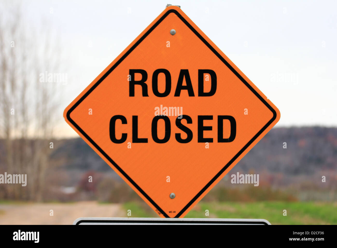 a road closed sign beside a highway Stock Photo - Alamy