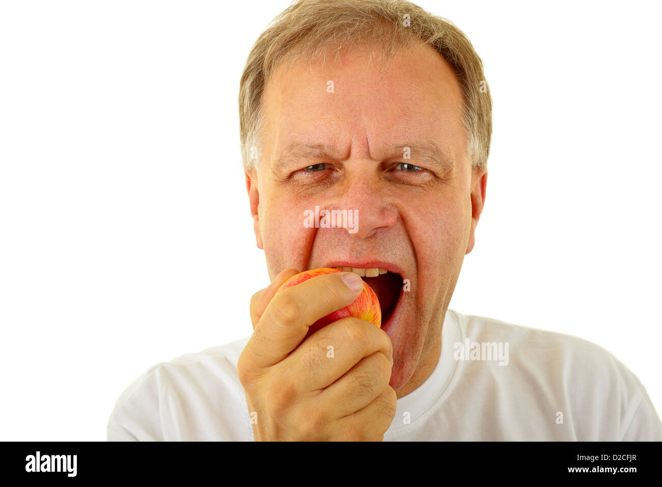 Man eating an apple Stock Photo - Alamy