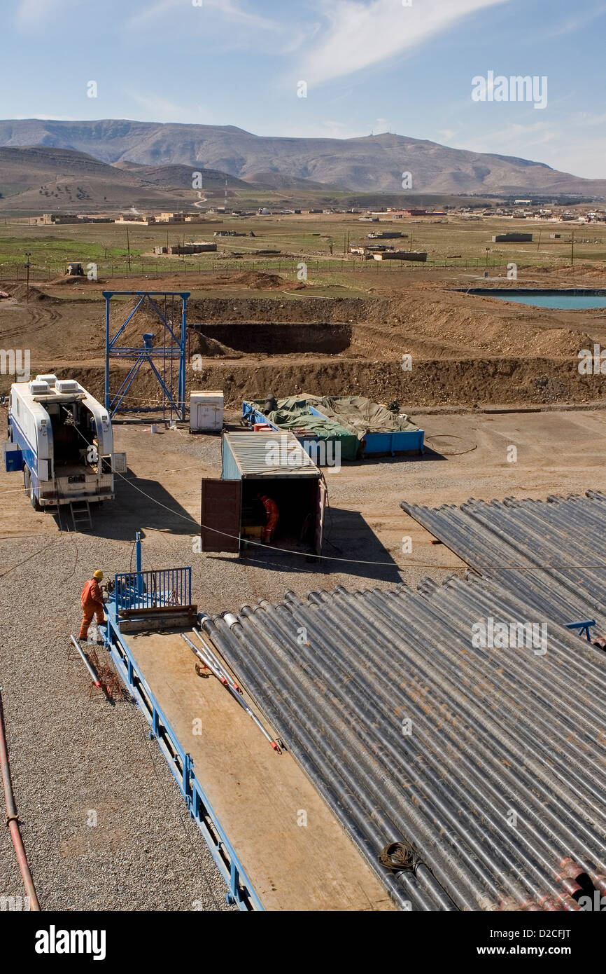 Onshore oil and gas exploration site. Pipes and casings in compound ...