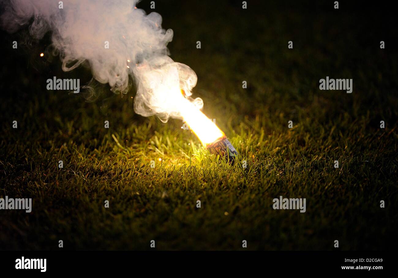 A flare sits on the field pictured during the German Bundesliga soccer ...