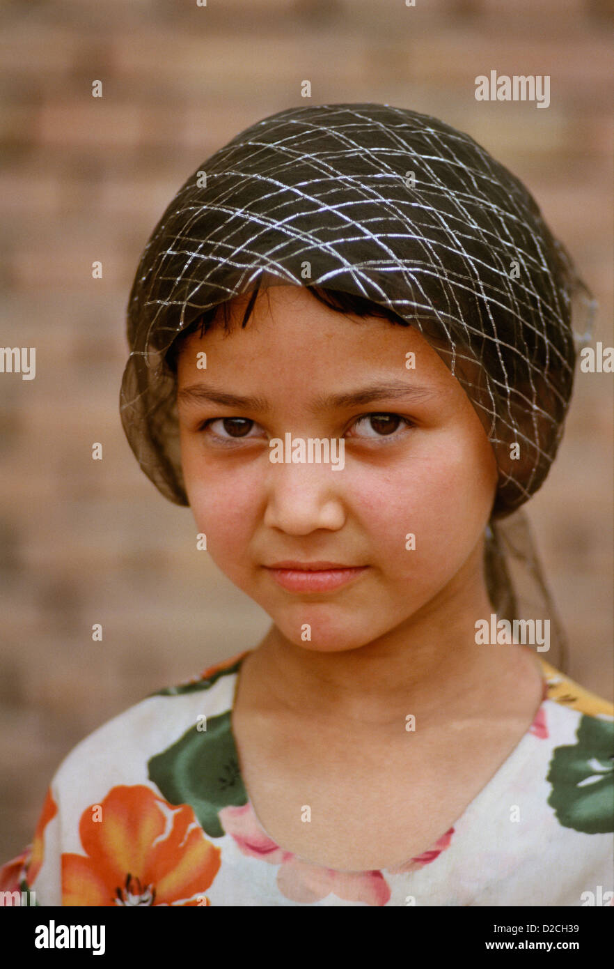 Uighur girl with scarf, Kashgar, Xinjiang province, China Stock Photo ...