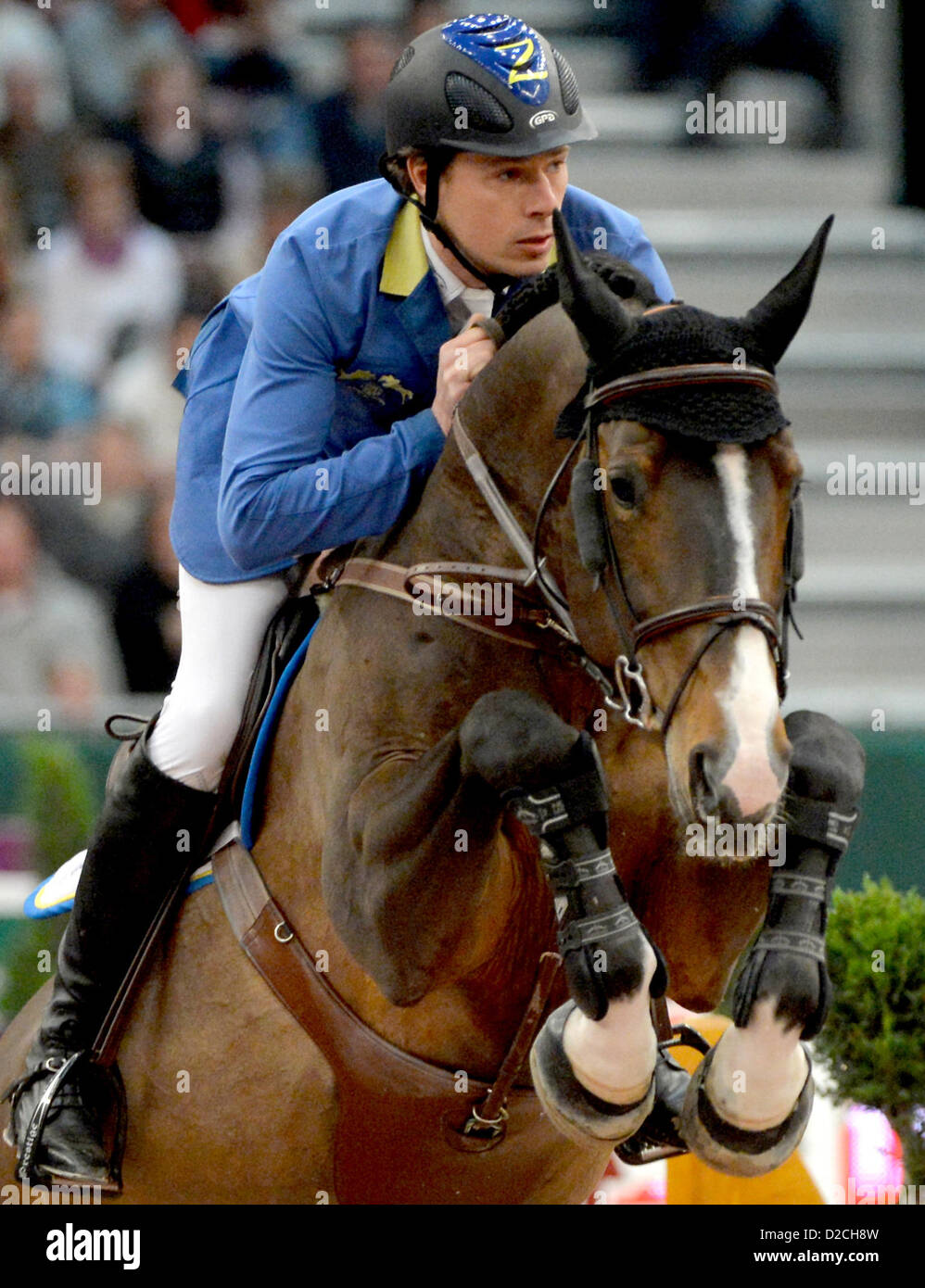 German show jumper Christian Ahlmann performs a jump on Taloubet to win ...